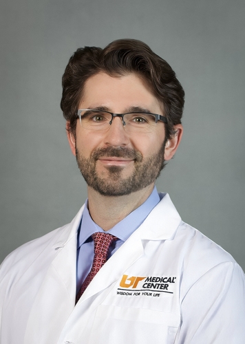 Christopher J. Carnabatu MD